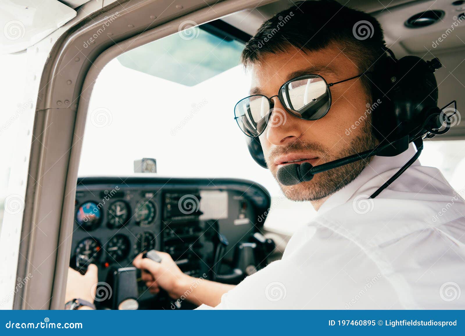 Pilot in Sunglasses and Headset Looking at Camera Stock Image - Image ...