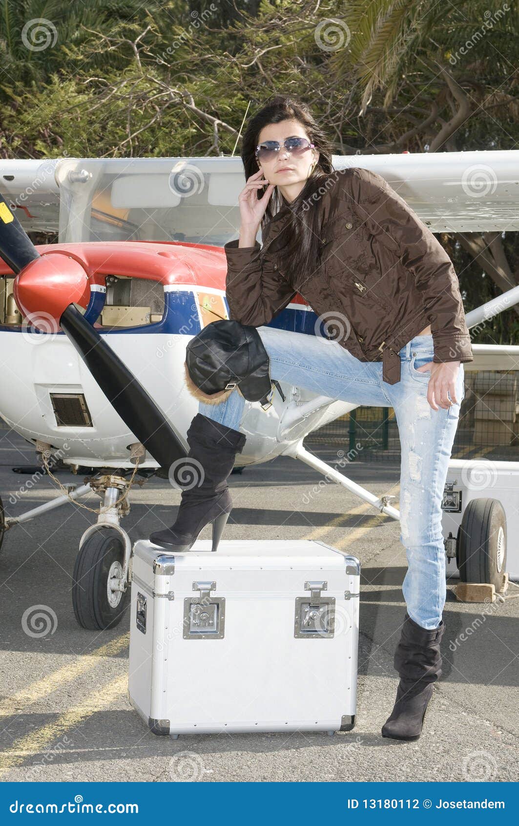 Pilot woman waiting to fly stock photo. Image of baggage - 13180112