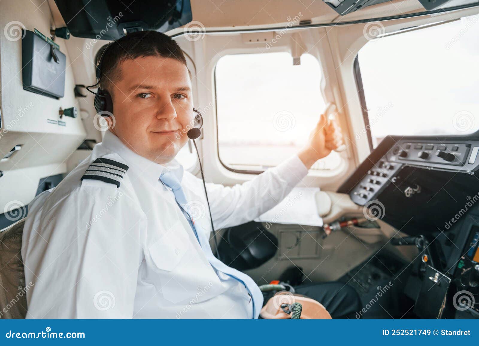 Pilot on the Work in the Passenger Airplane. Preparing for Takeoff ...