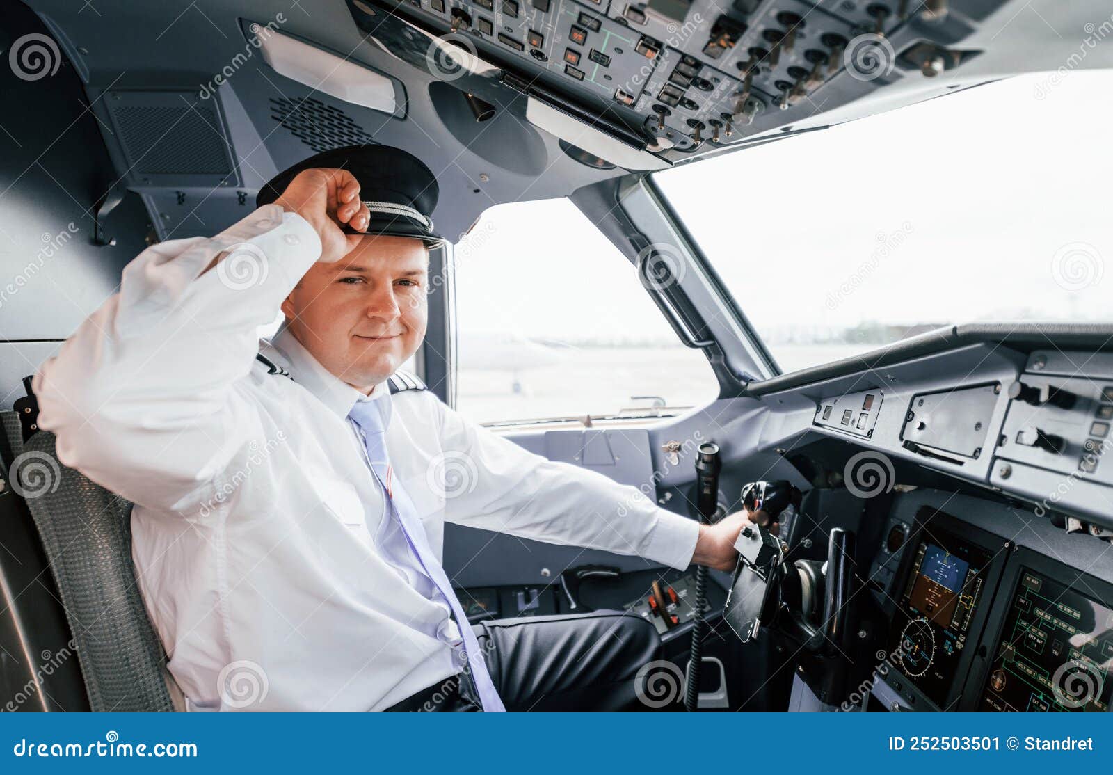 Pilot on the Work in the Passenger Airplane. Preparing for Takeoff ...
