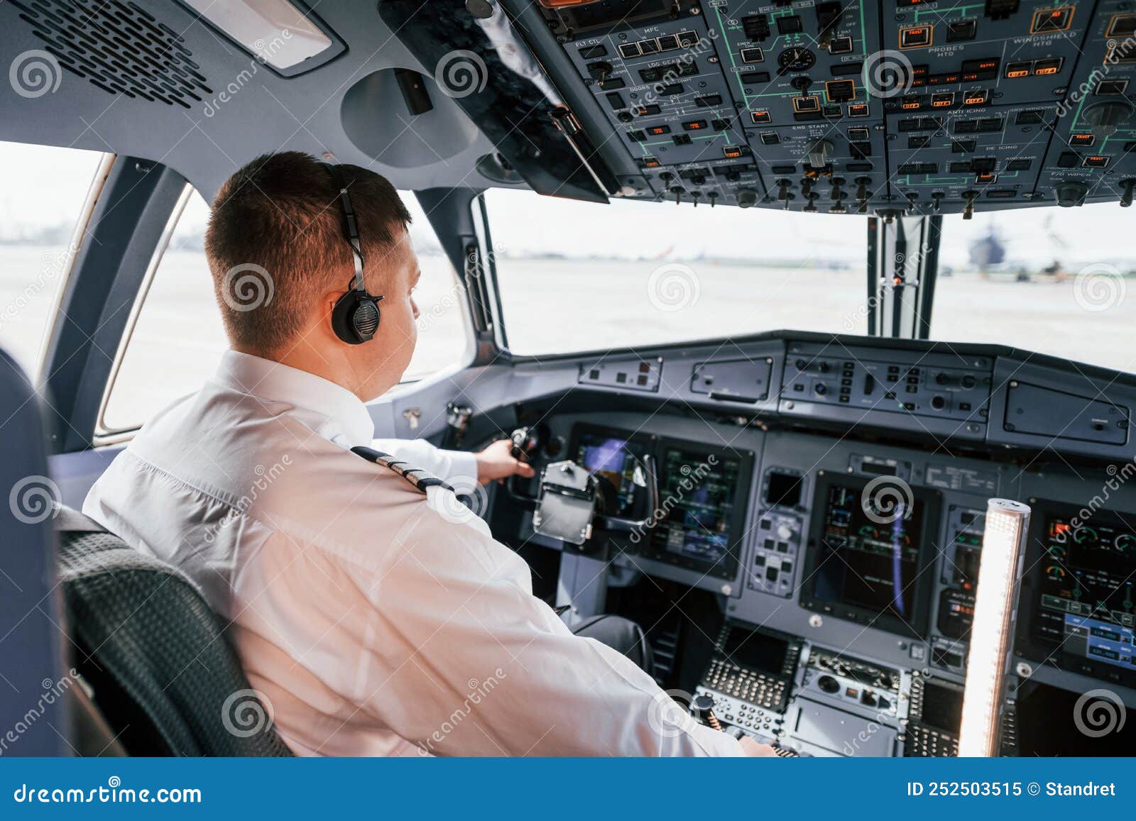 Pilot on the Work in the Passenger Airplane. Preparing for Takeoff ...