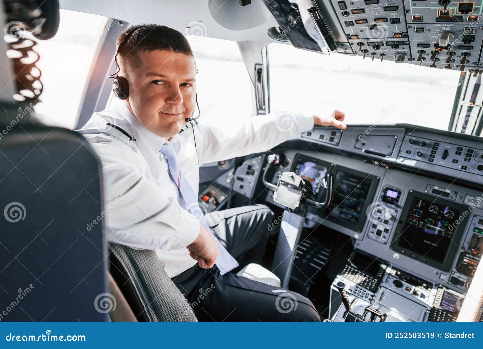 Pilot on the Work in the Passenger Airplane. Preparing for Takeoff ...