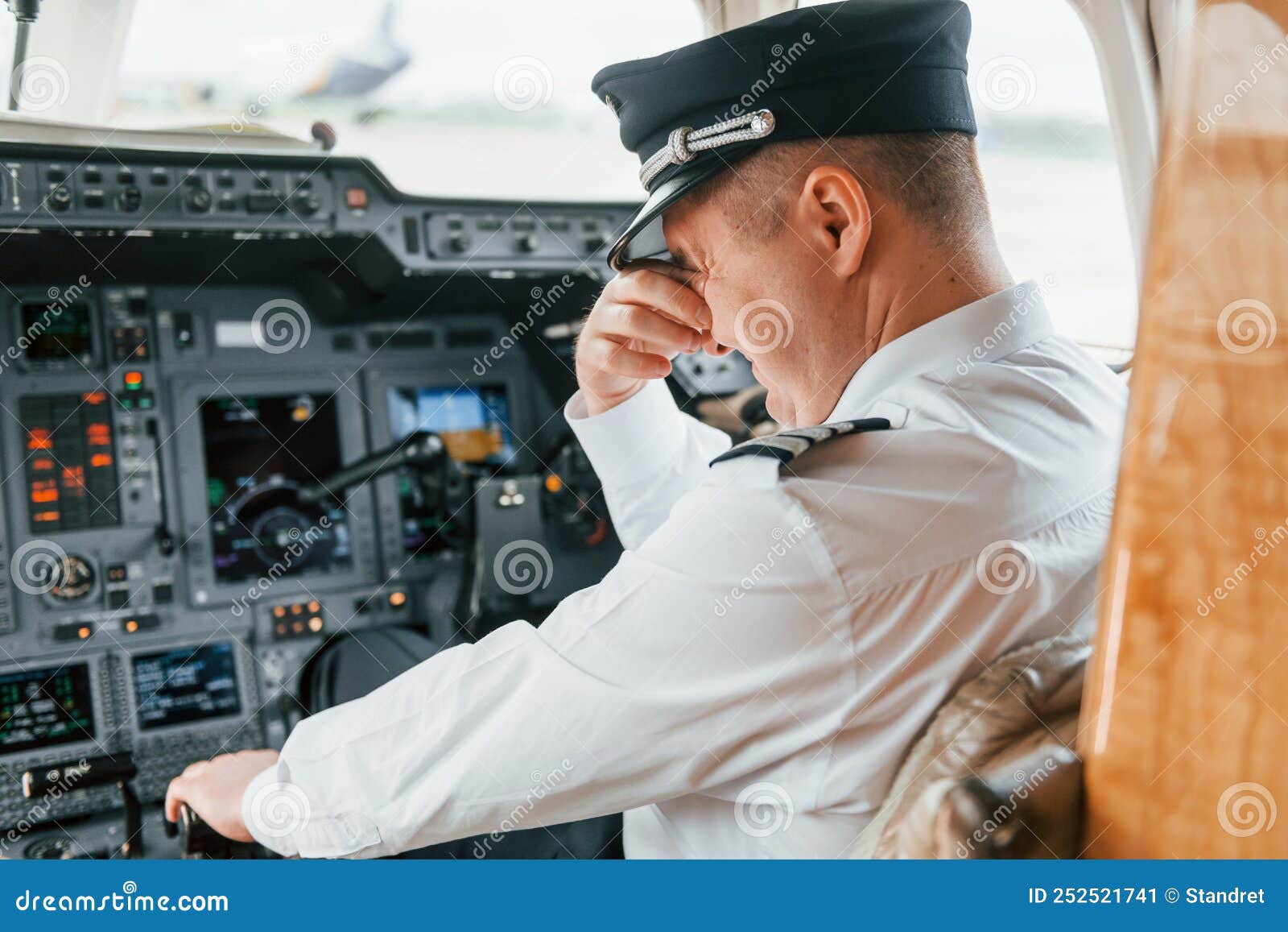 Pilot on the Work in the Passenger Airplane. Preparing for Takeoff ...