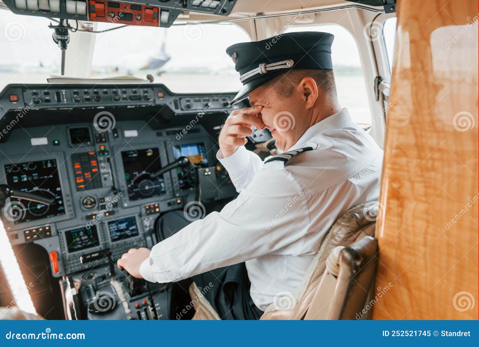Pilot on the Work in the Passenger Airplane. Preparing for Takeoff ...