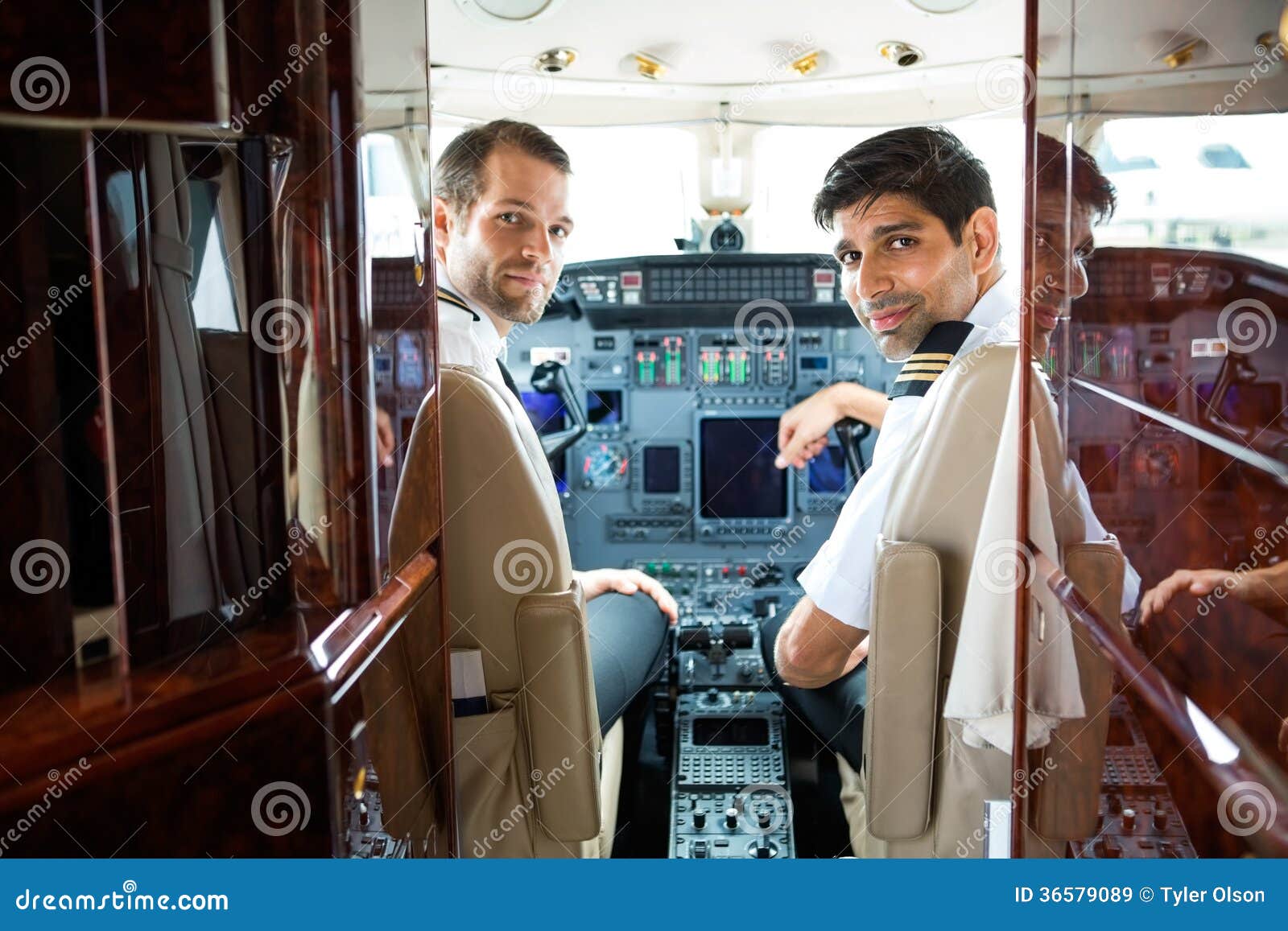 Pilots in Corporate Plane Cockpit Stock Image - Image of person, luxury ...