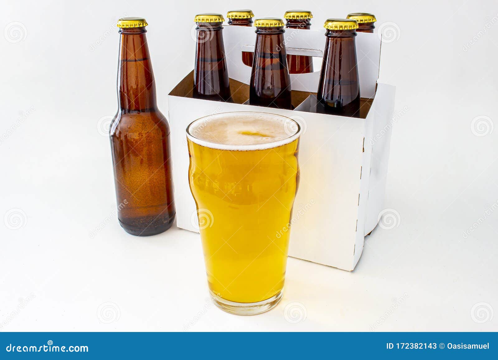 A Pilsner Style Lager Brown Bottle Sic Pack with a Full Pint of Beer ...