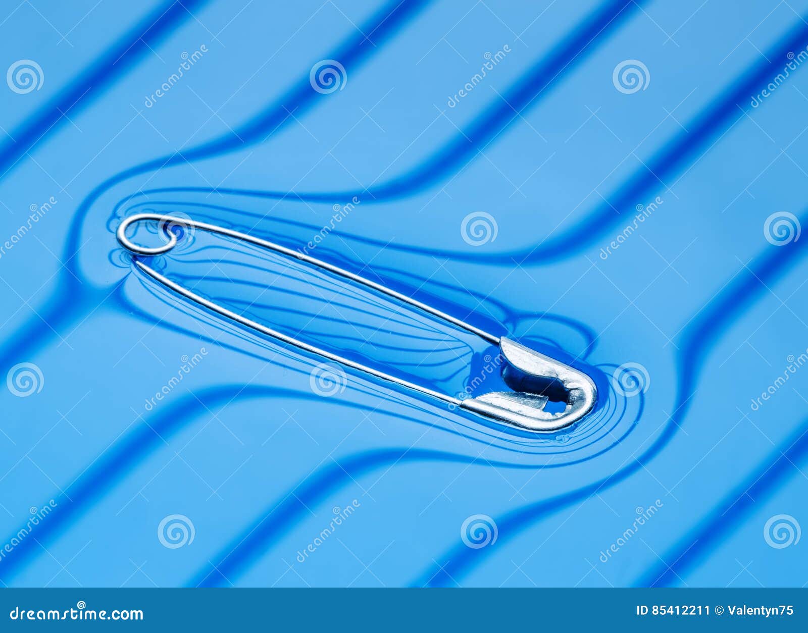 Pin Floating on Water Surface. Stock Image - Image of steel, float ...