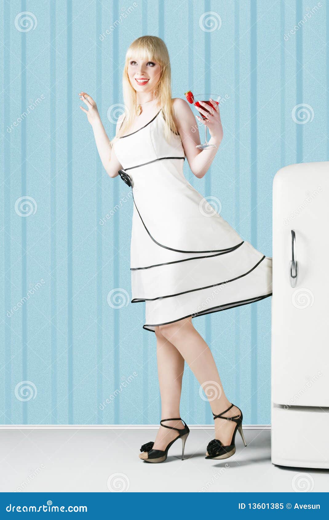 Pin-up girl with cocktail stock image. Image of dress - 13601385