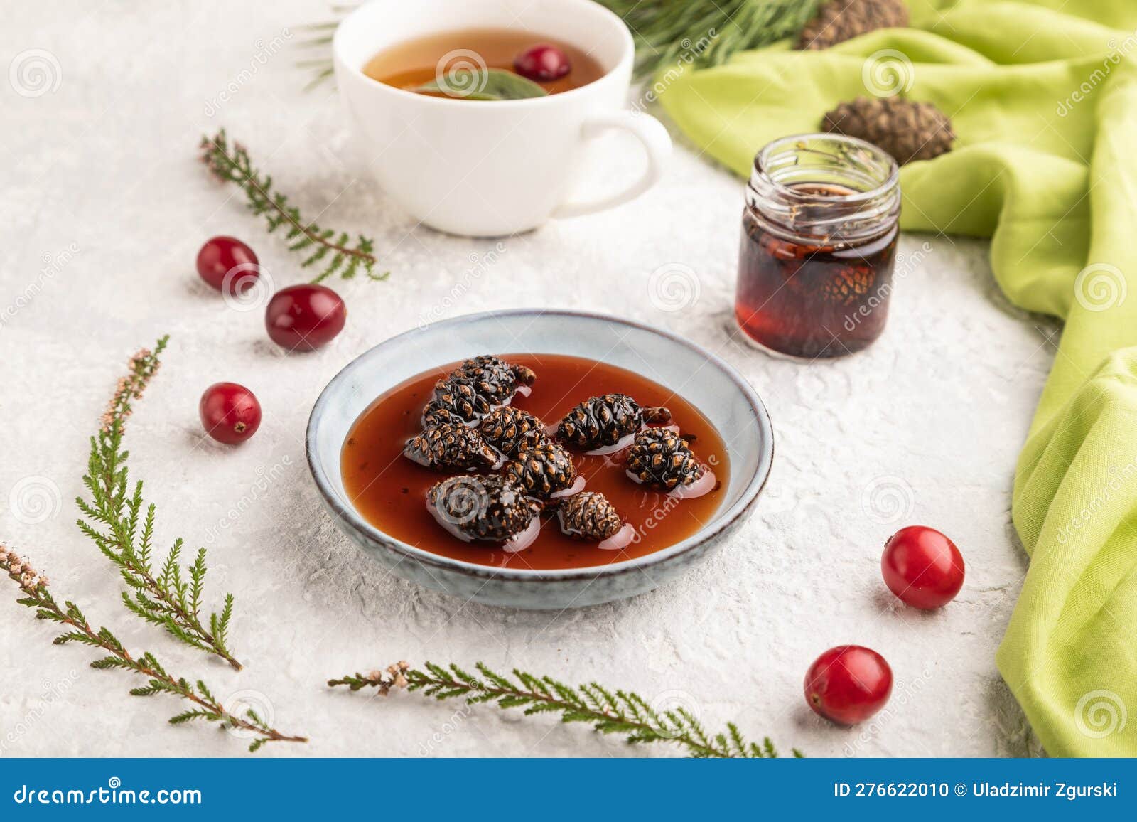 Pine Cone Jam with Herbal Tea on Gray Concrete, Side View, Selective ...