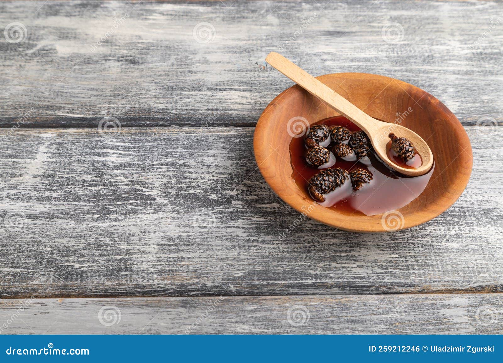 Pine Cone Jam in Wooden Bowl, Side View, Copy Space Stock Photo - Image ...