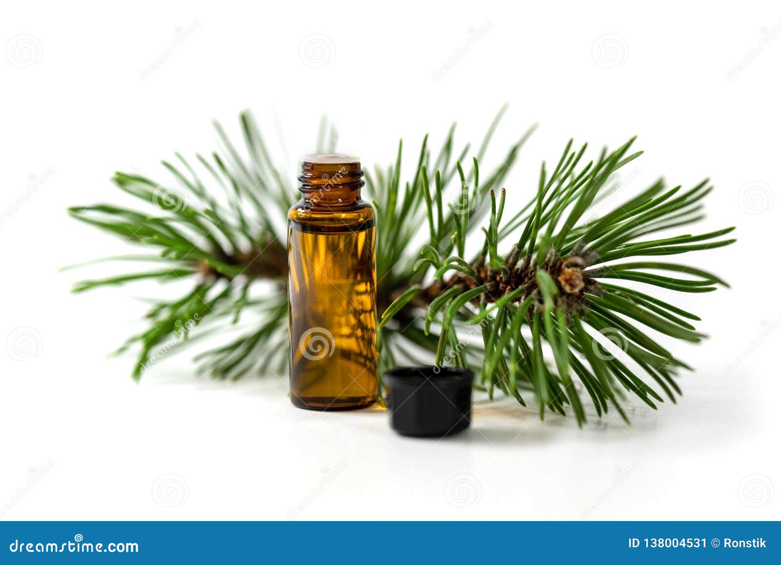 Pine Essential Oil Bottle and Tree Branch Isolated on White Stock Image ...