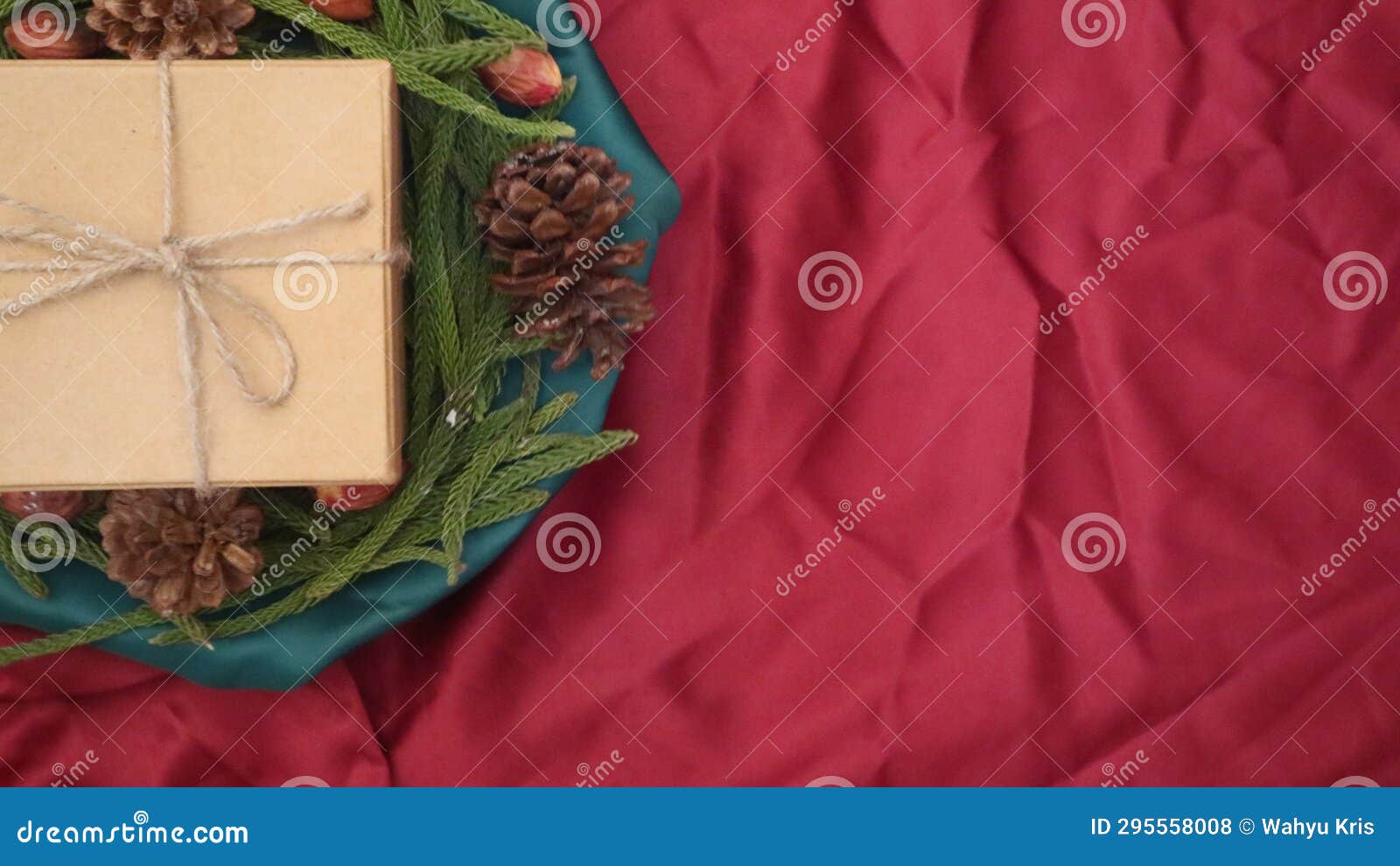 Pine Leaves, Dried Pine, and Gift Box with Red Background. Concept of Christmas Stock Photo ...