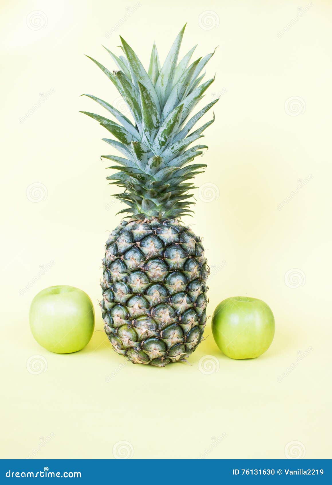 Pineapple and green apples stock photo. Image of object - 76131630