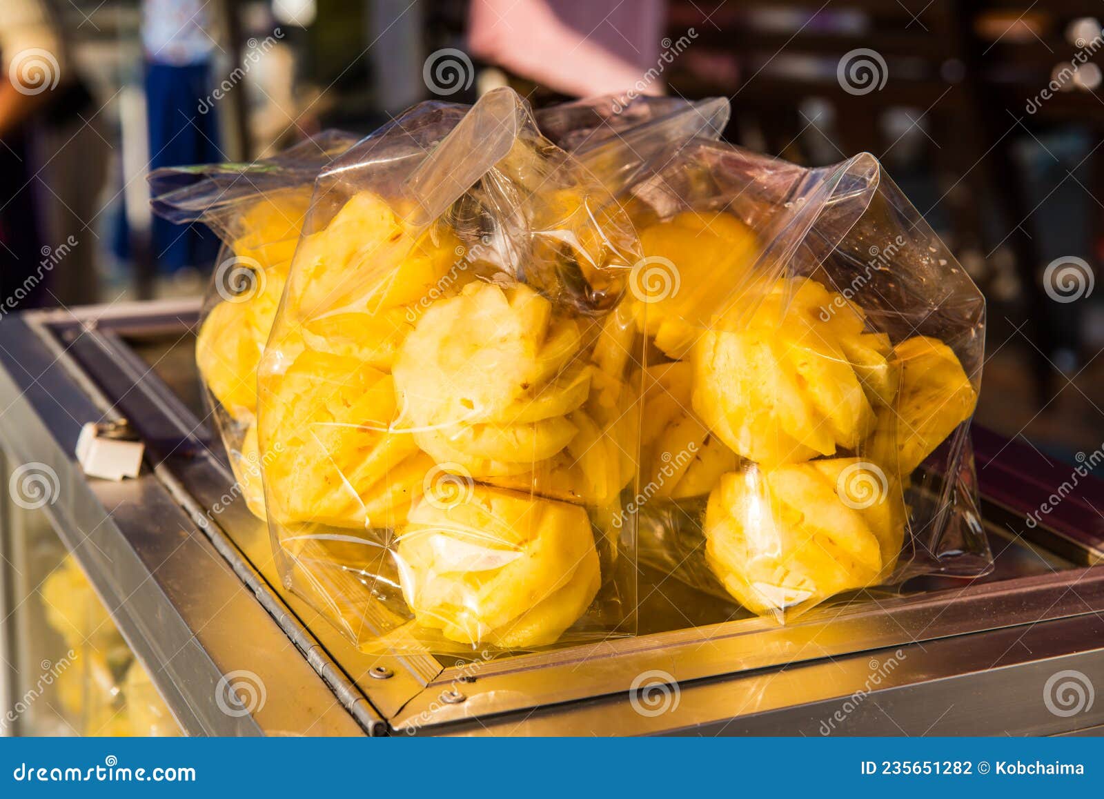 Pineapple in plastic bag stock photo. Image of style - 235651282