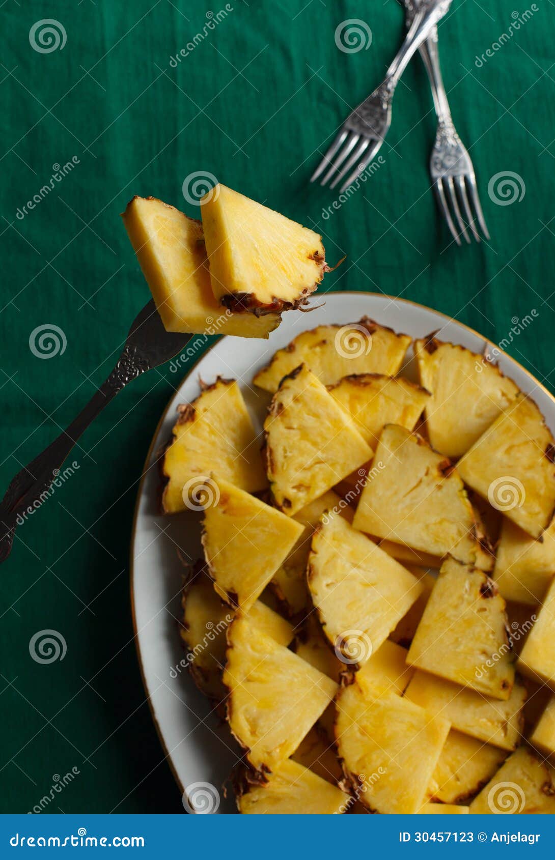 Pineapple slices on plate stock image. Image of tropical - 30457123