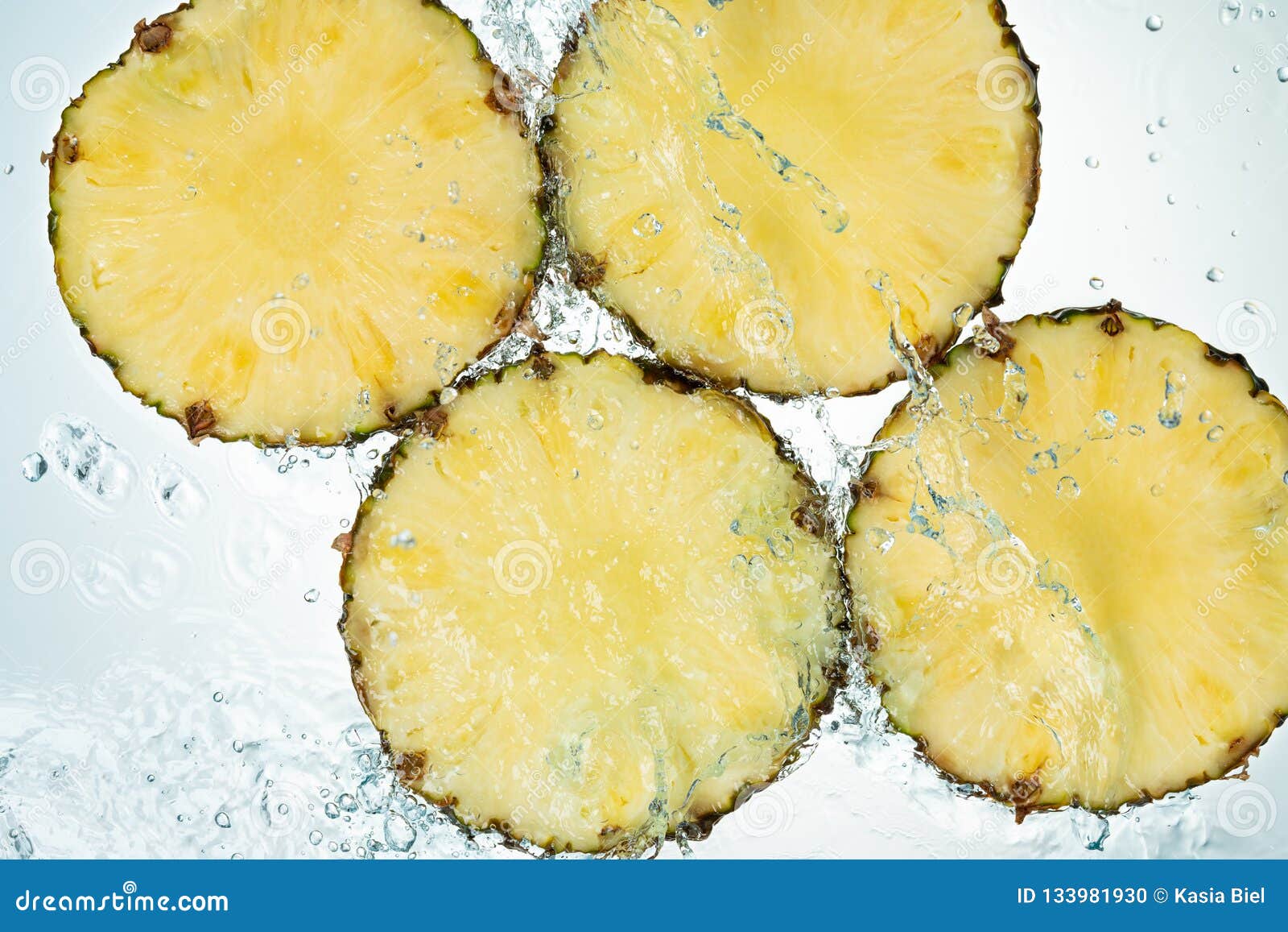 Pineapple Water Splash stock photo. Image of sliced - 133981930