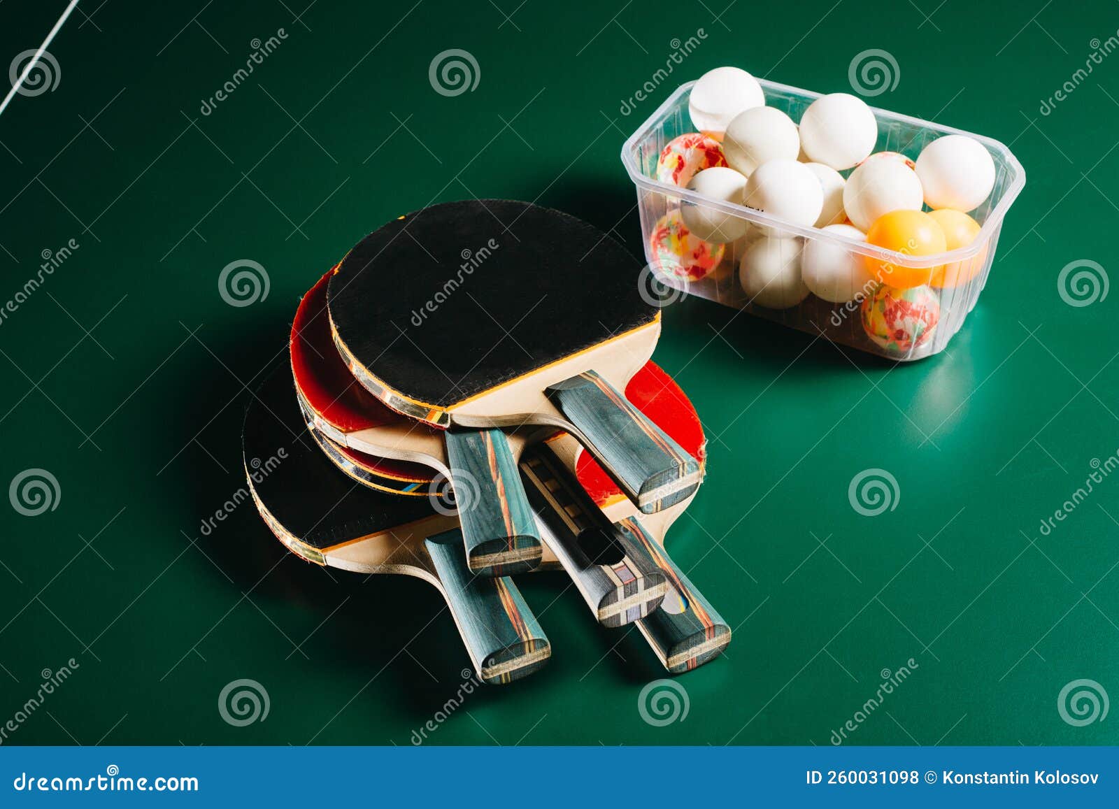 Ping Pong Rackets and Box of Balls on Green Gaming Table Stock Photo ...