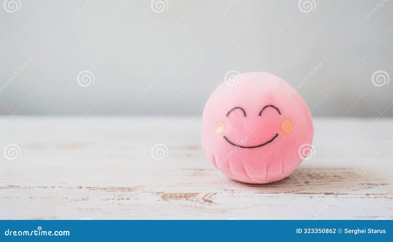 A Pink Ball with a Smiley Face Drawn on it Sitting Next To Another, AI ...