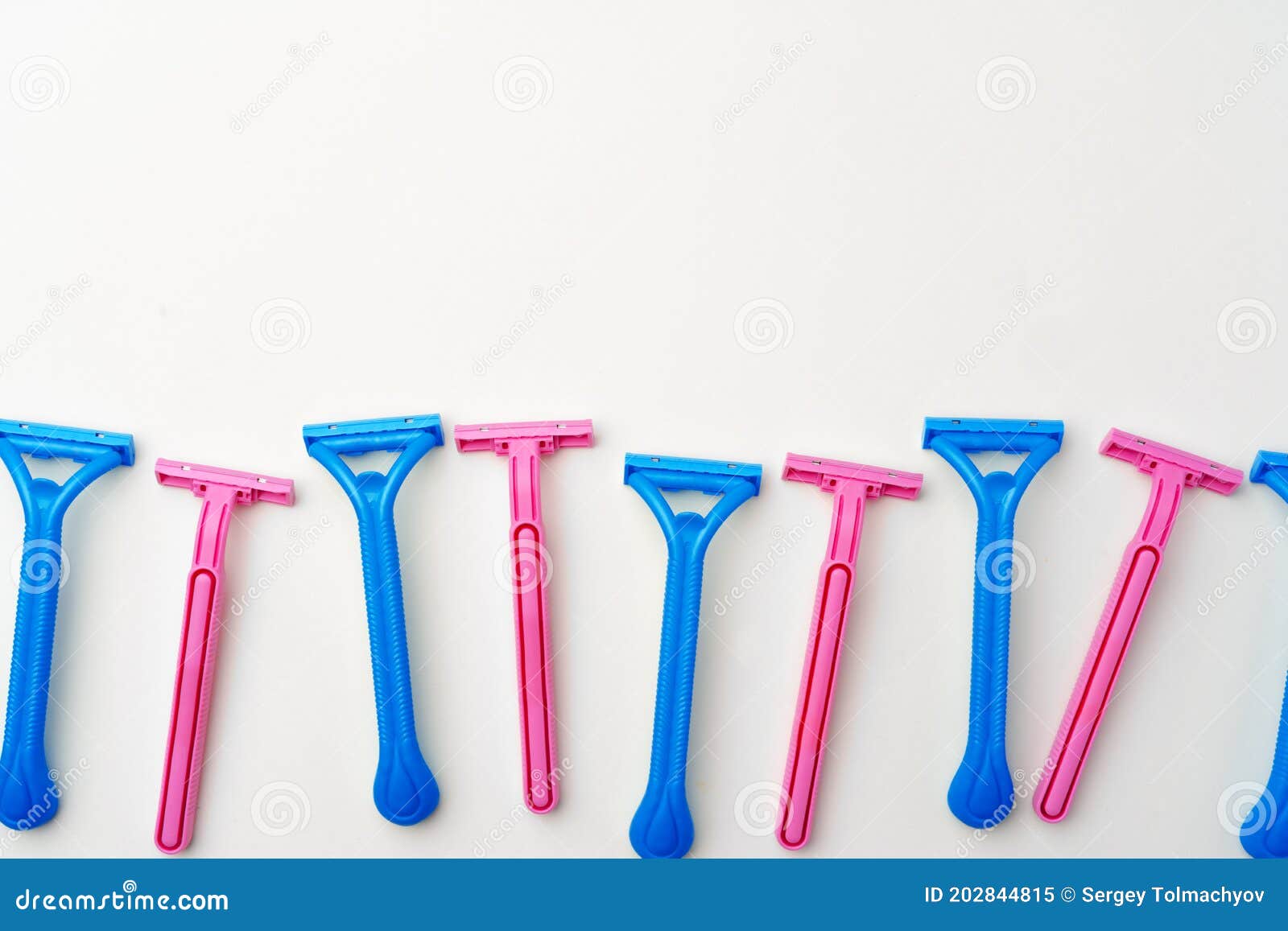 Pink and Blue Razors on White Background Stock Image - Image of ...