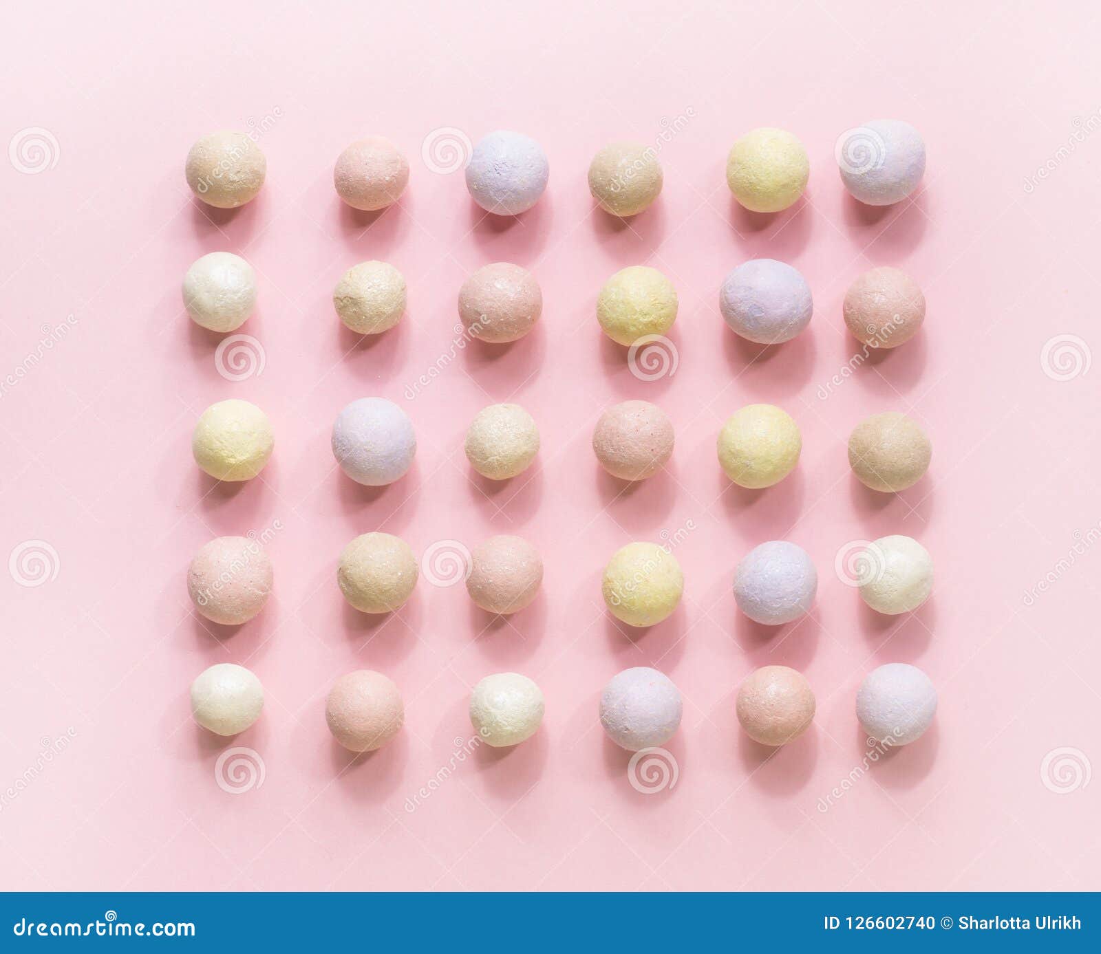 Pink Blusher Balls in a Row on a Pink Background. Stock Photo - Image ...