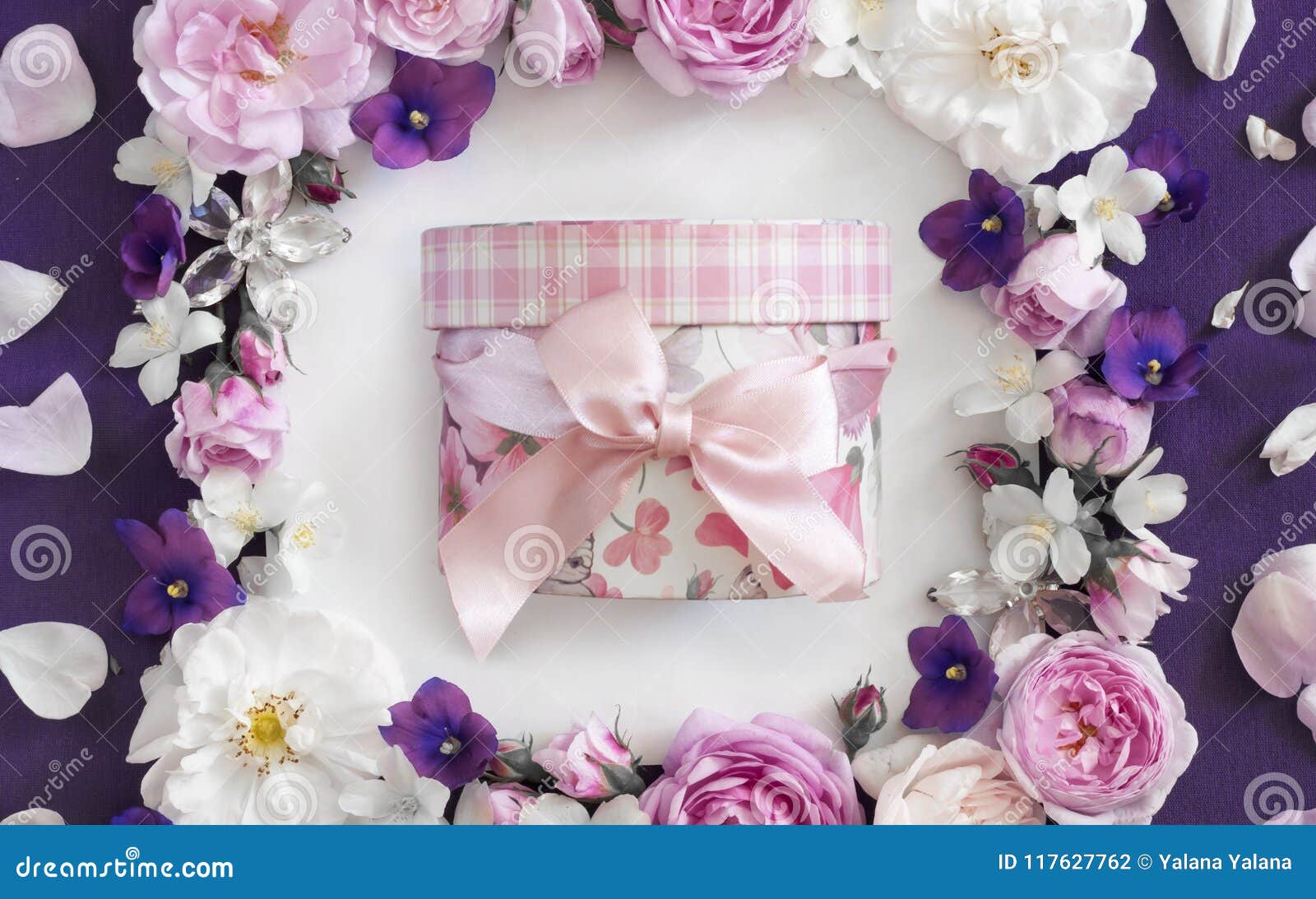 Pink Box with a Bow in the Frame of Flowers Stock Photo - Image of ...