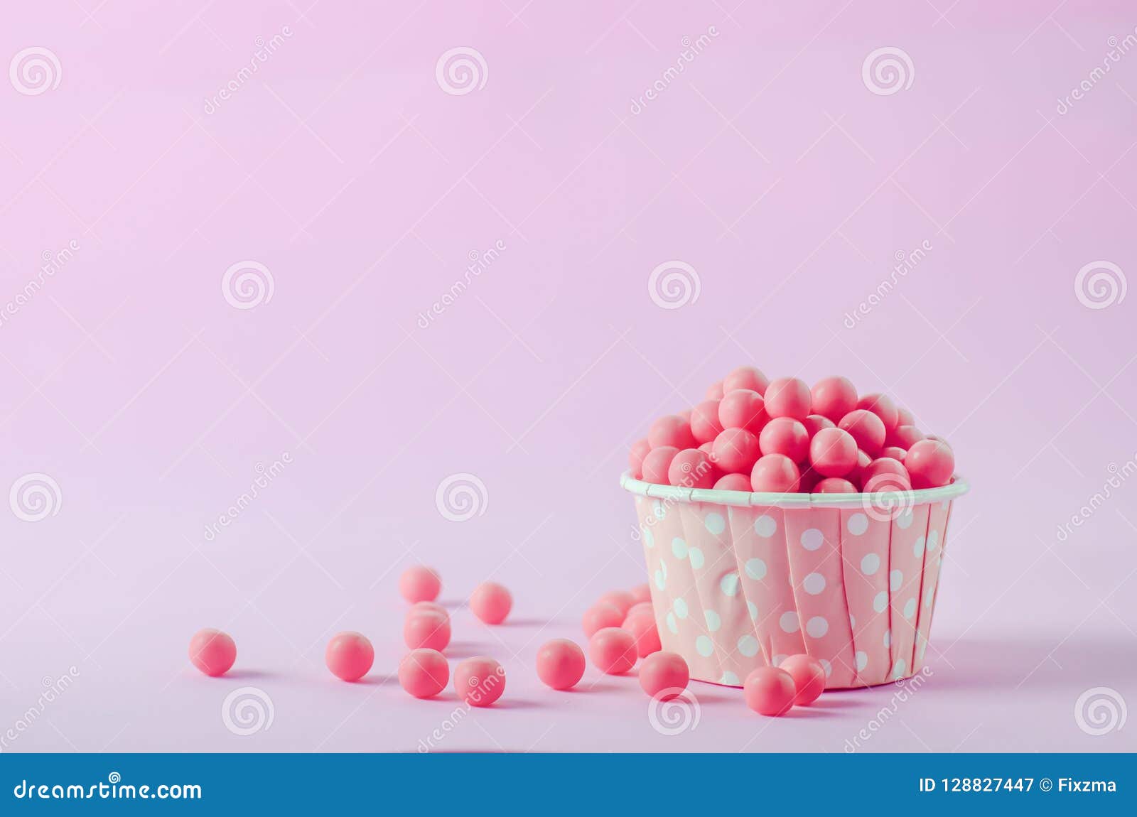 Pink Candies in Pink Paper Cup with White Polka Dot Pattern on P Stock ...