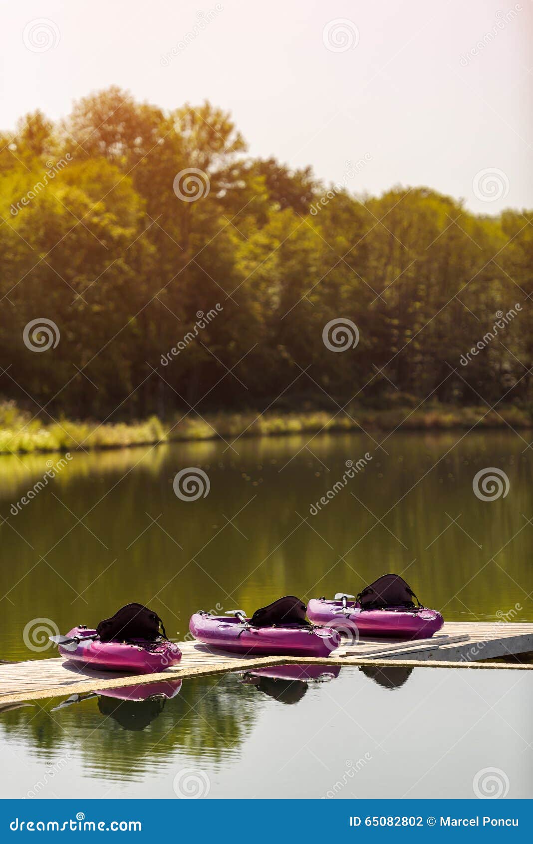 Pink Canoes on Beautiful Lake Stock Photo - Image of background ...