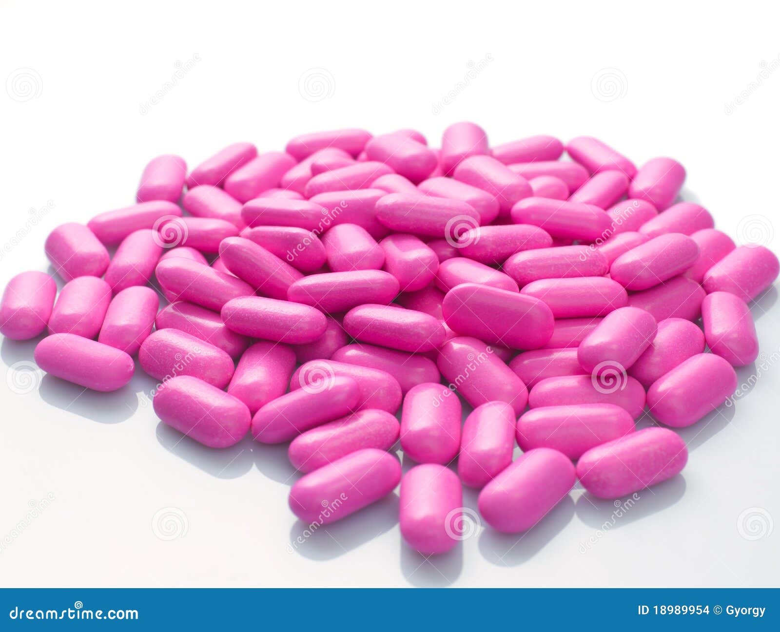 Pink Capsules On White Background Stock Images - Image: 18989954