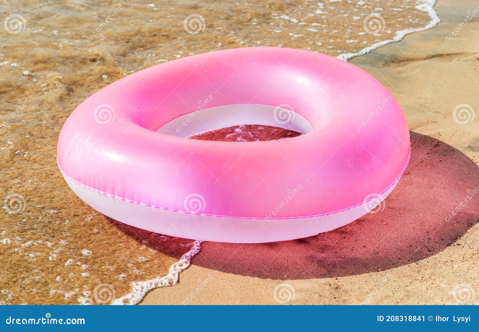 Pink Circle Float at Sea Shore Stock Image - Image of swim, float ...