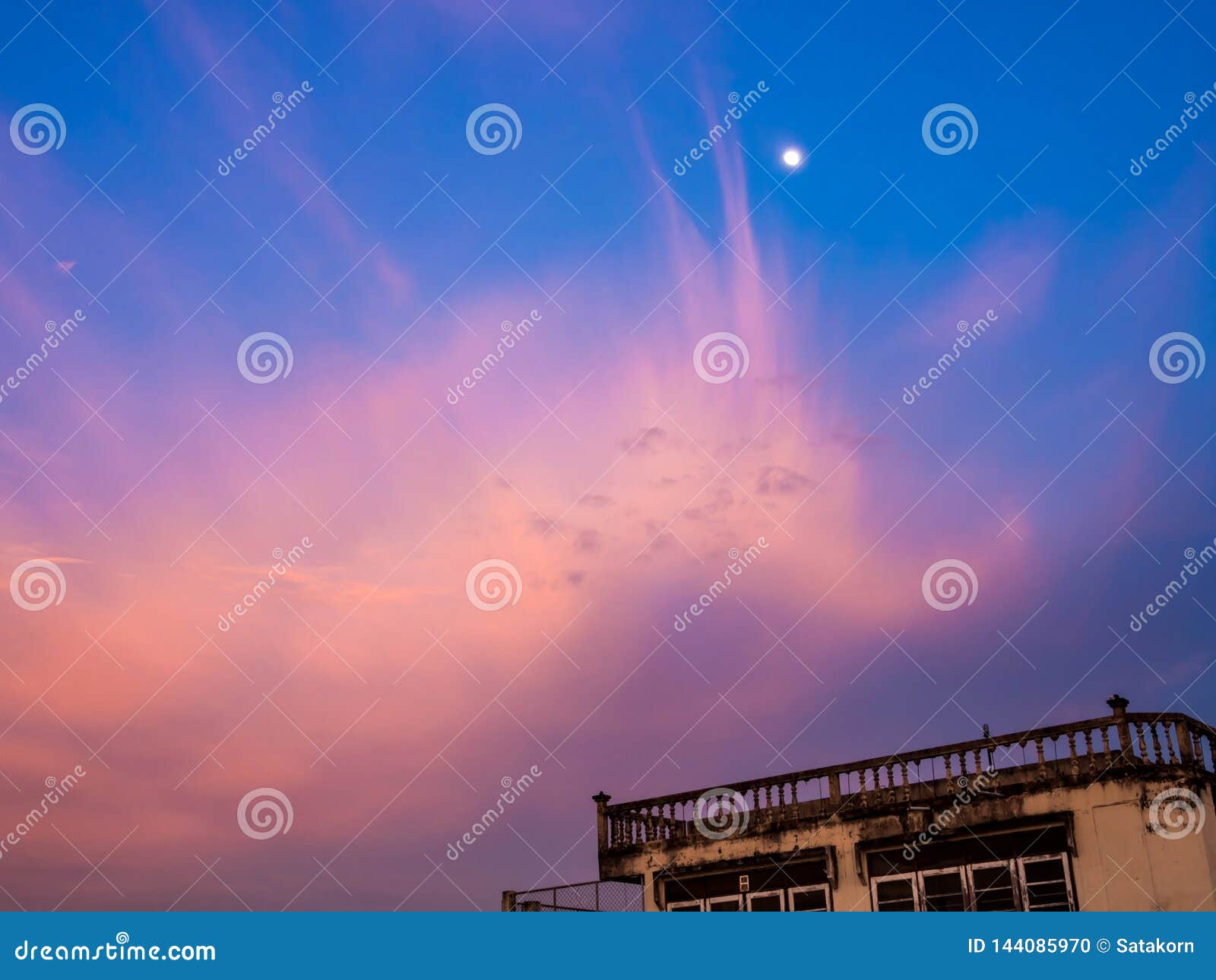 Pink Clouds and Moon in Sunset Sky Stock Photo - Image of background ...