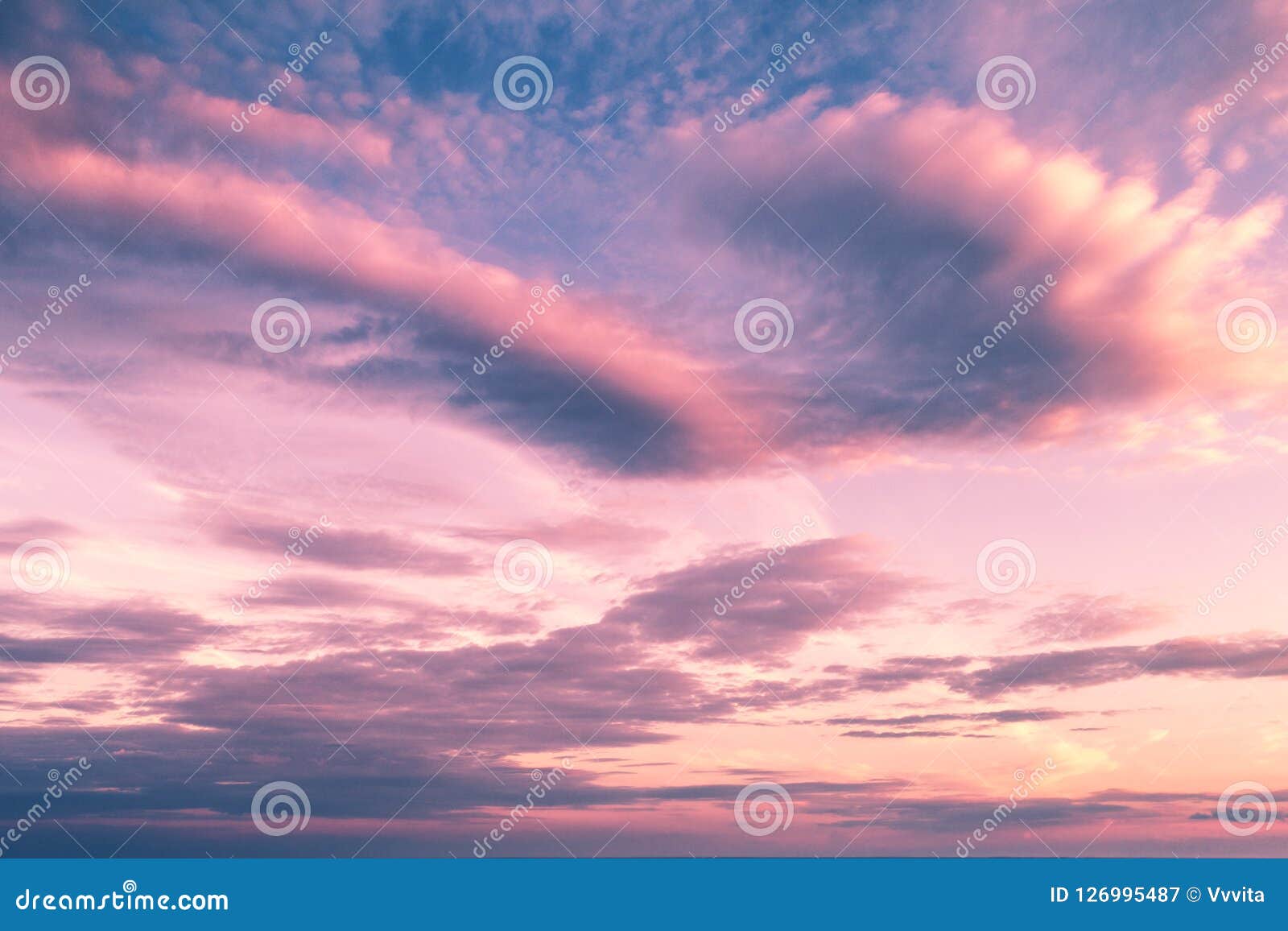 Pink cloudy sky at sunset stock image. Image of nature - 126995487