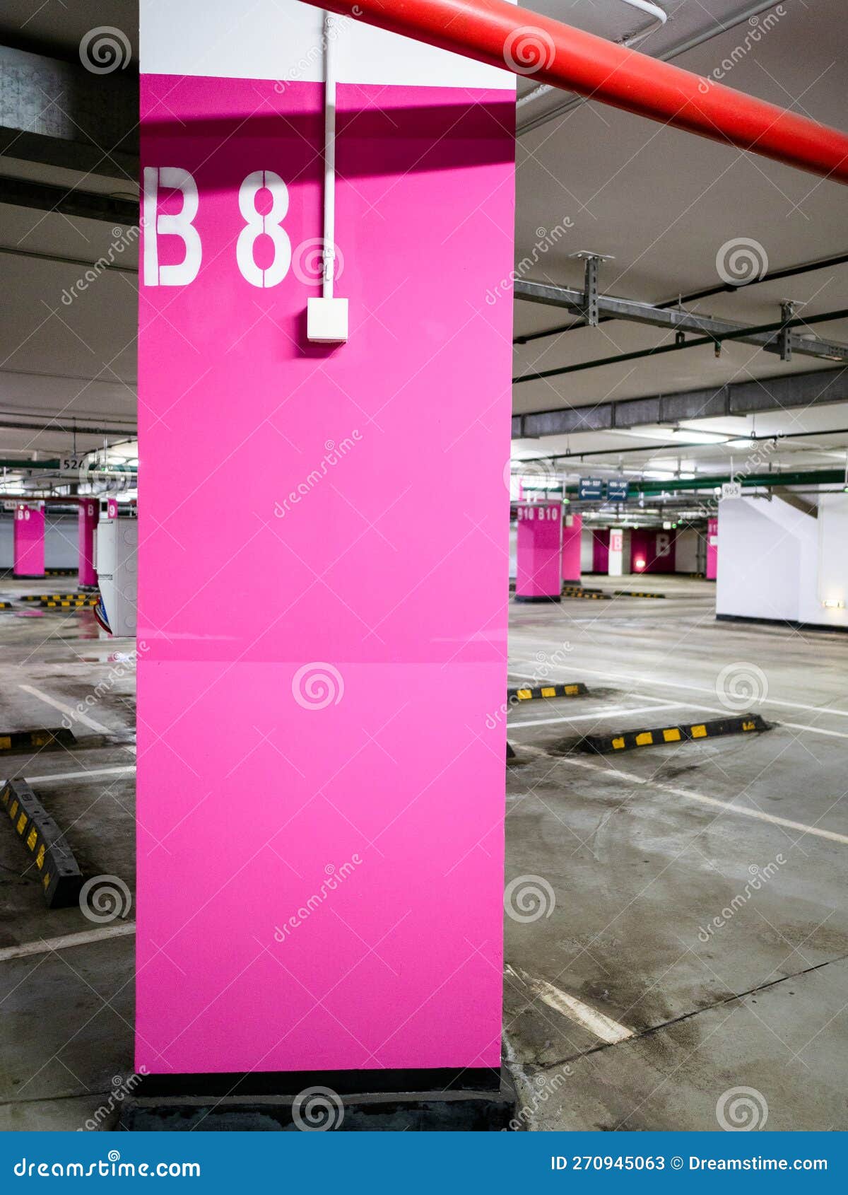 Pink Concrete Post in Underground Parking Area Stock Image - Image of ...