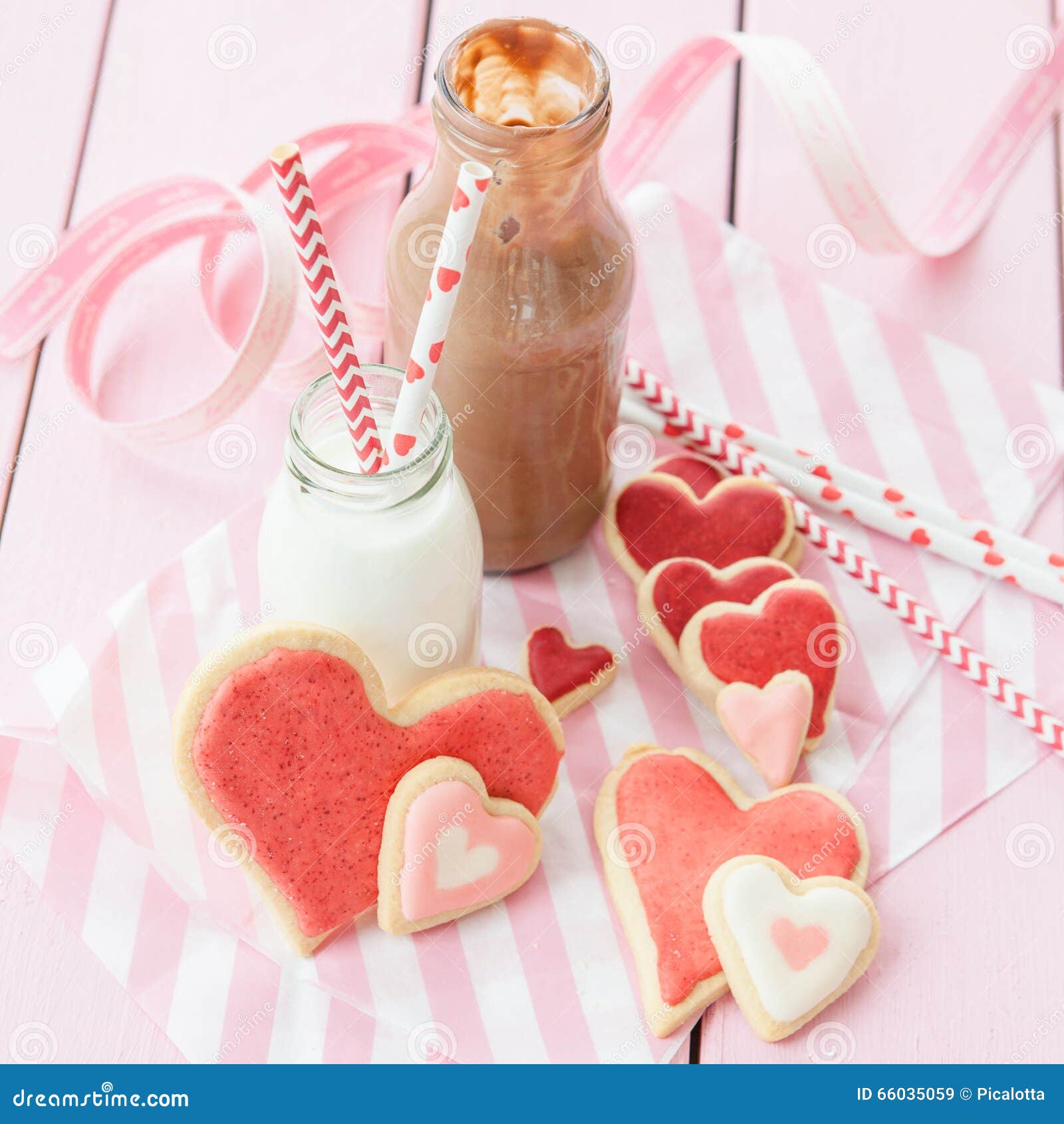 Pink cookies and milk stock image. Image of cocoa, coated - 66035059