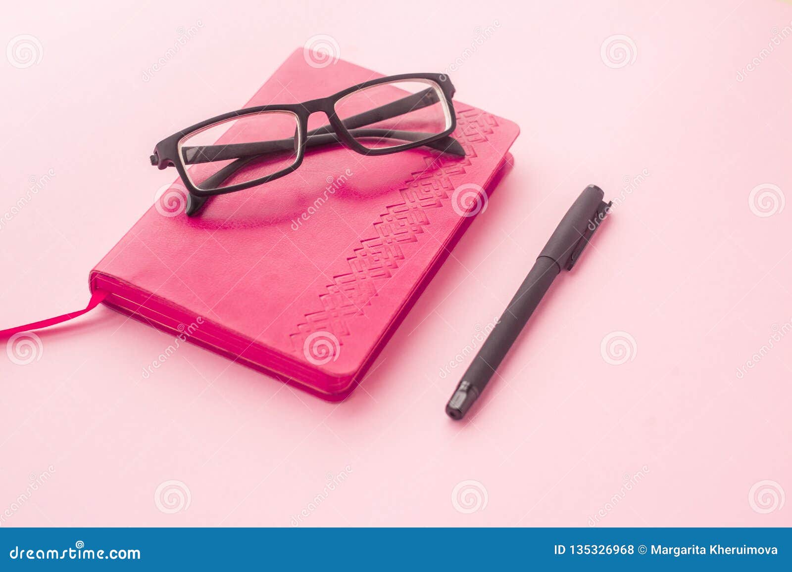 Pink Diary, Pen and Glasses Top View on a Pink Background. Selective ...