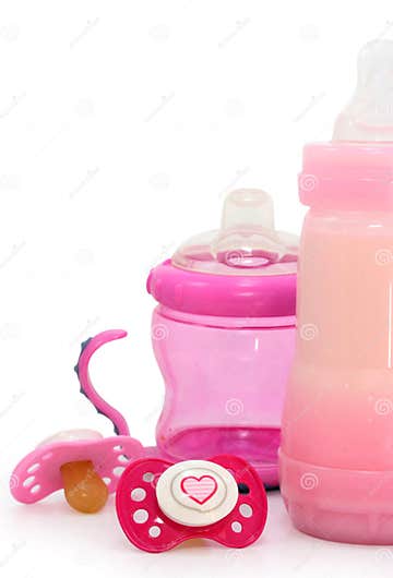 Pink Dummies and Bottles on White Stock Image - Image of healthy ...