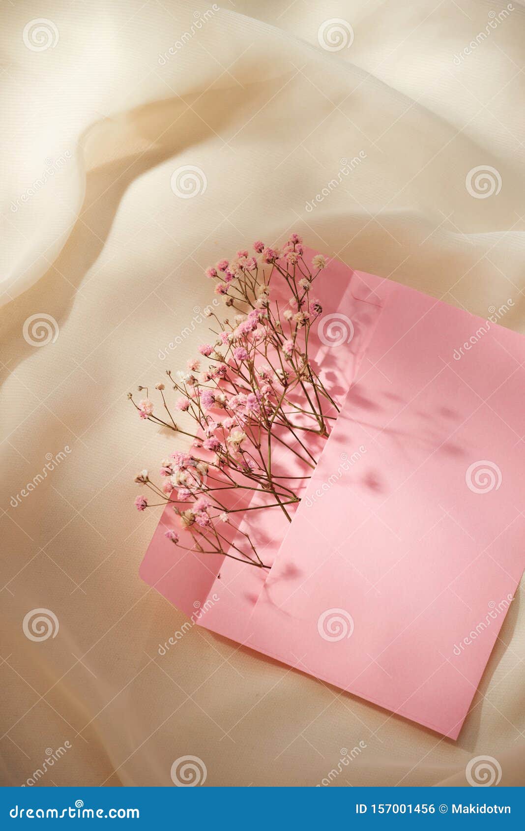 Pink Envelope with a Spring Flower Arrangement. Flat Lay, Top View ...