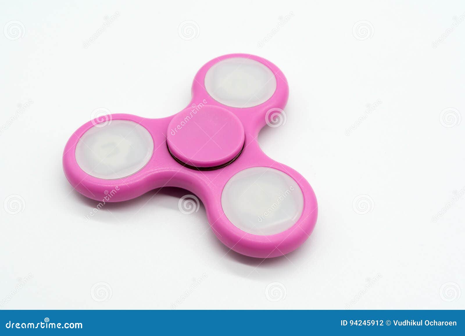 Pink fidget spinner stock photo. Image of blur, palm - 94245912