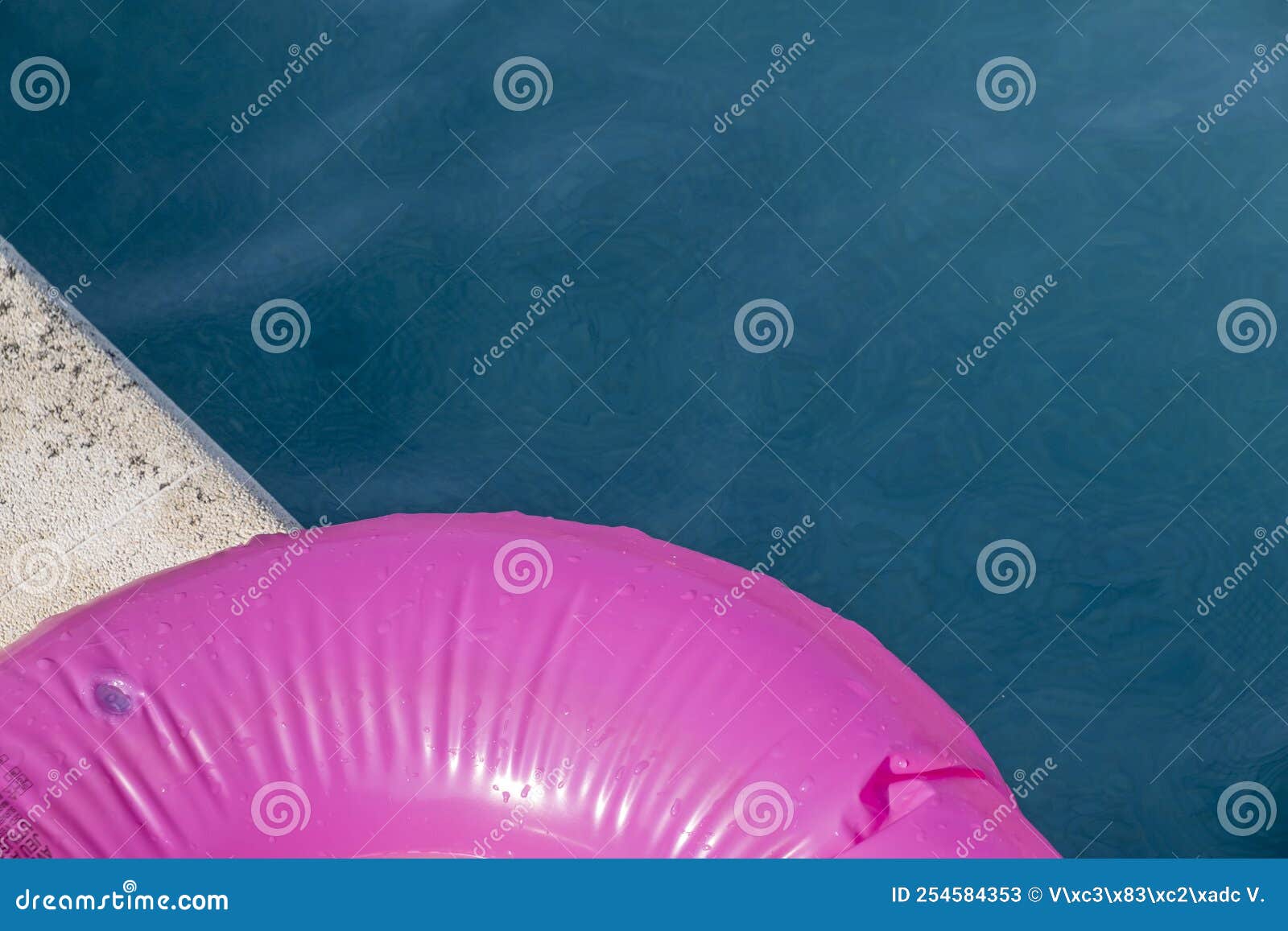 Pink Float on the Edge of a Swimming Pool Stock Image - Image of ...