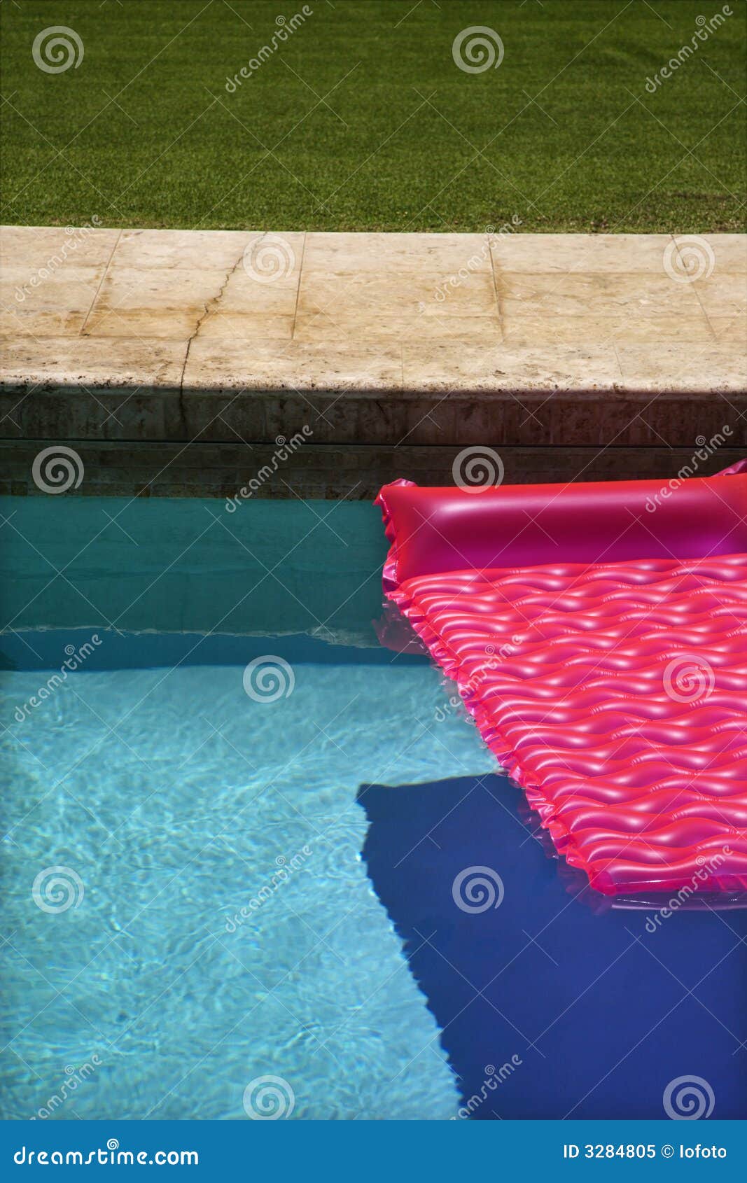 Two Pink Float Rings In A Swimming Pool Stock Photography ...