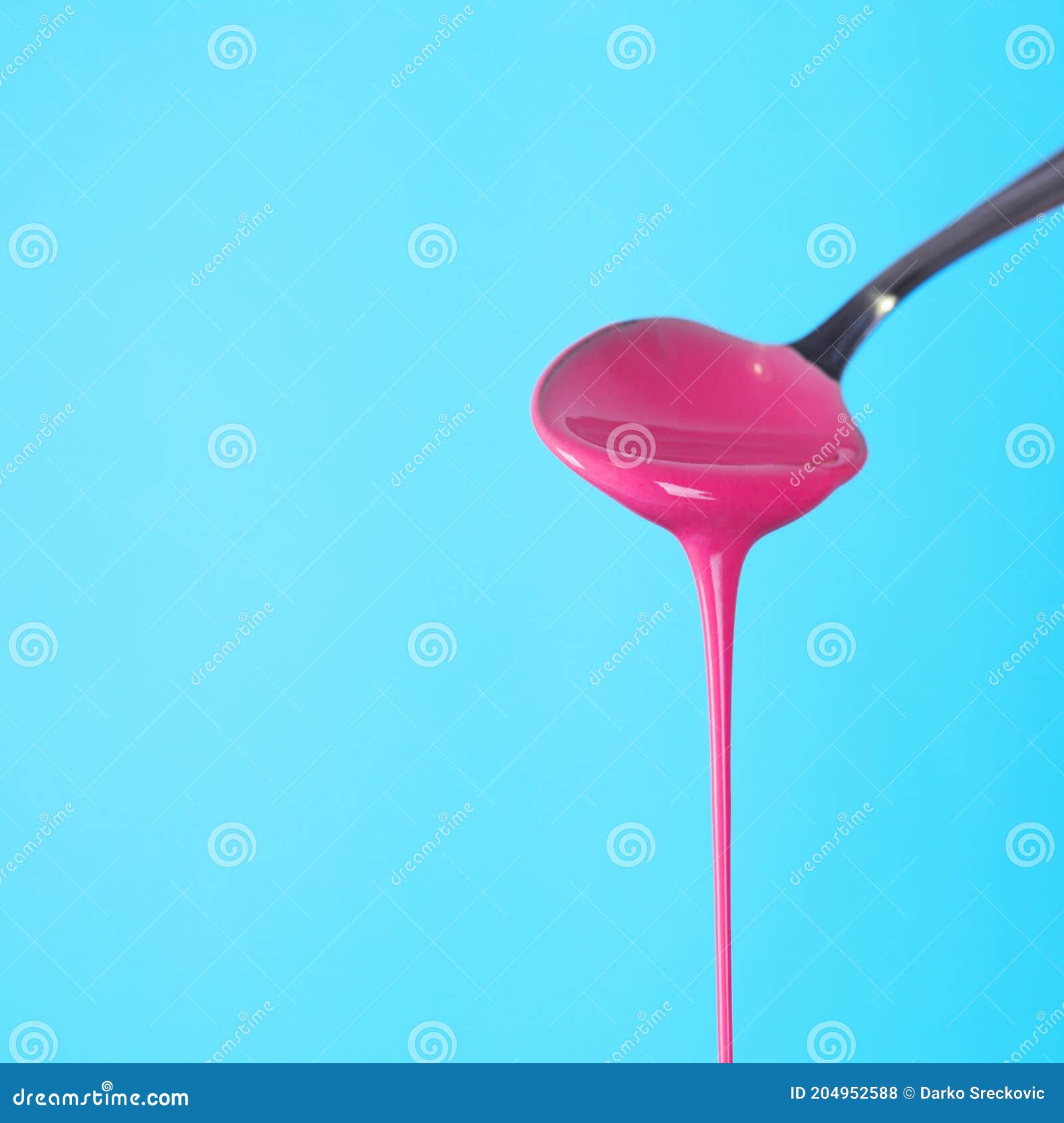 Pink Fluid Dripping from Spoon Stock Photo - Image of trend, surreal ...