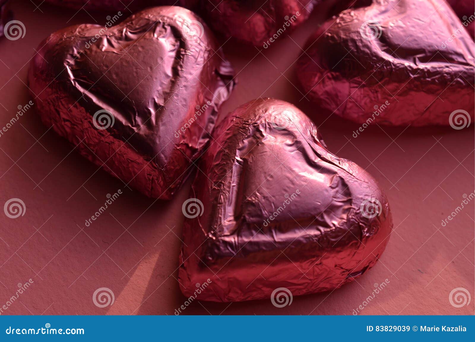 Pink Foil Wrapped Heart Shape Chocolate Pieces Stock Image - Image of ...