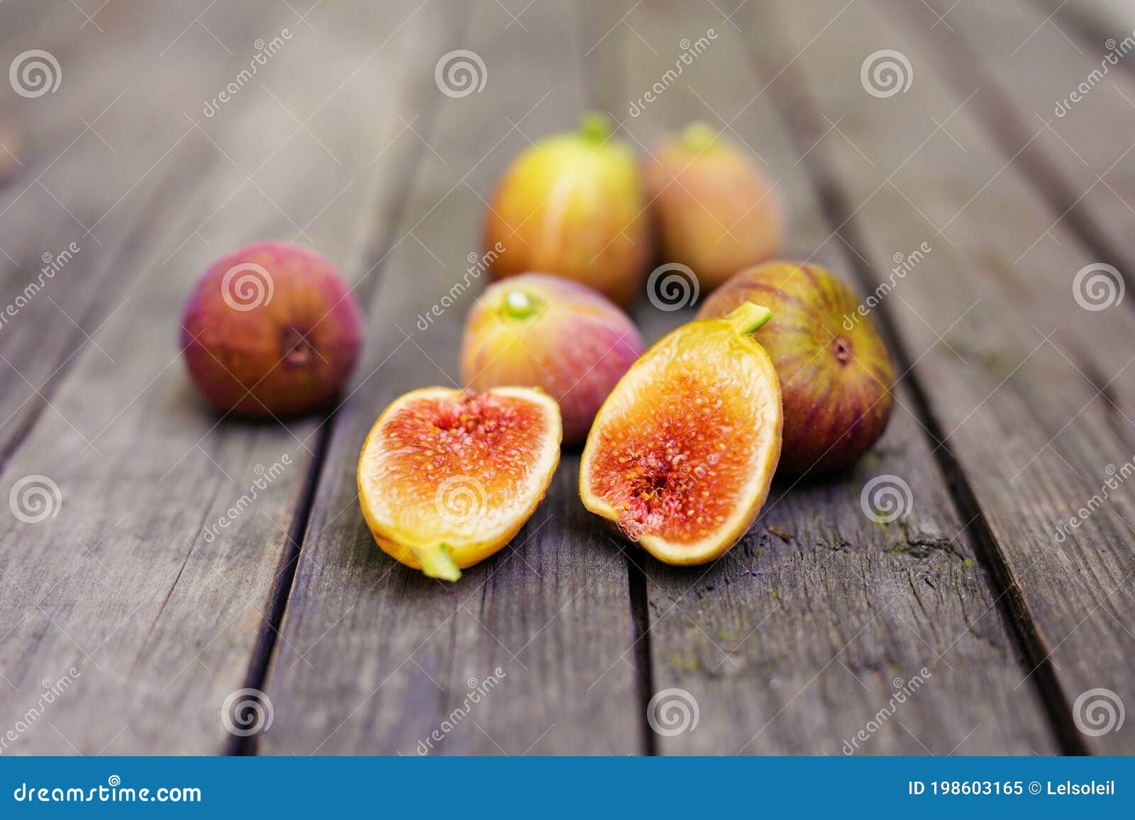 Pink Fresh Figs on the Old Wooden Table Stock Image - Image of vitamin ...