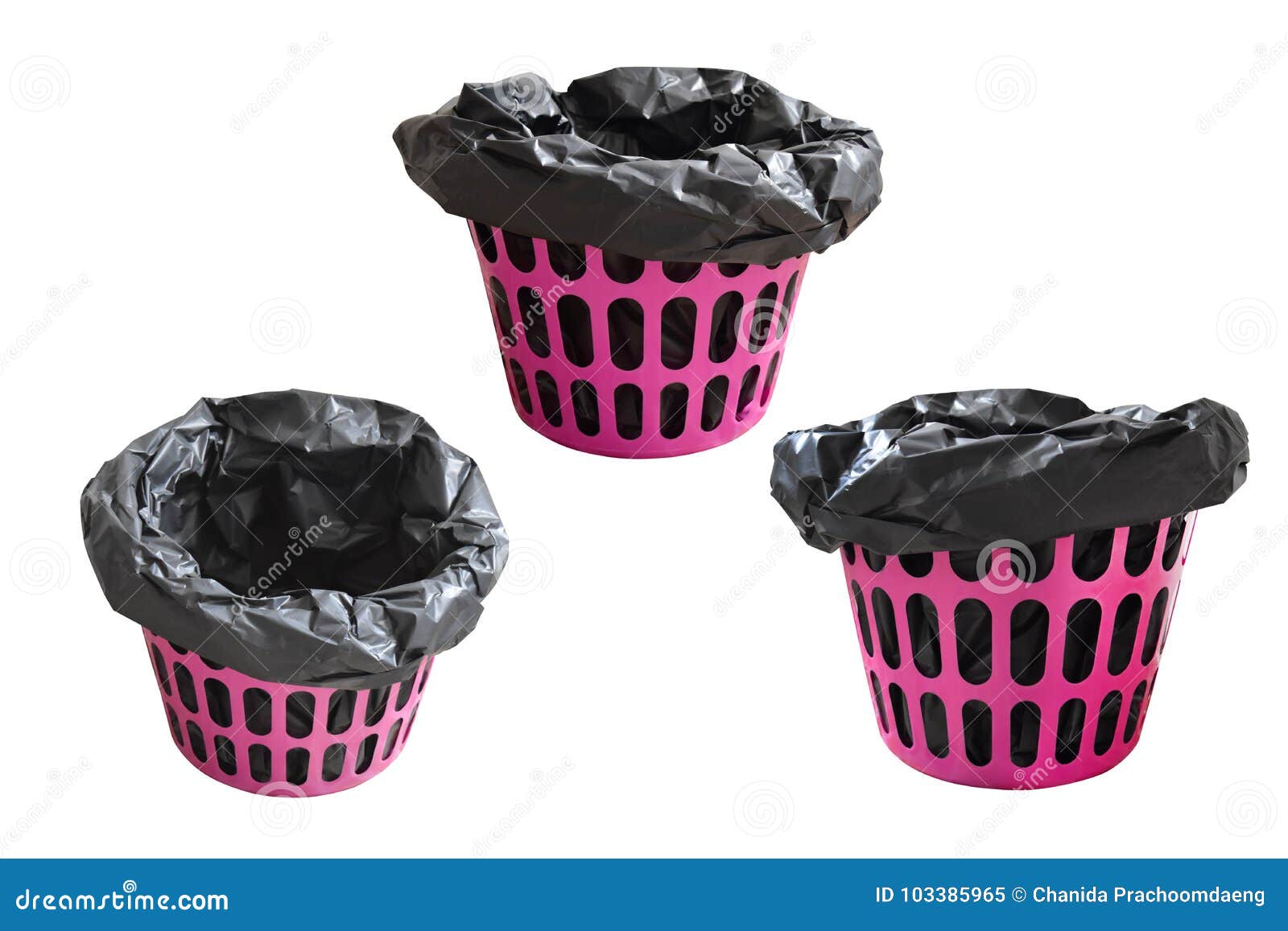 A Pink Garbage Can Full Of Different Paper Banknotes Against Green ...