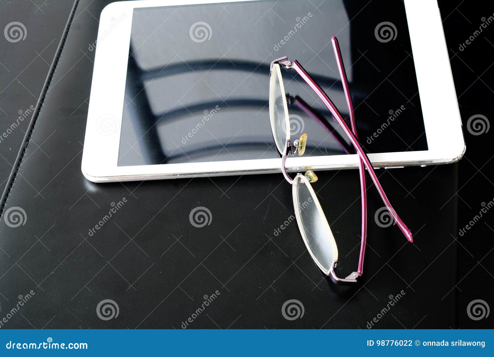 A Pink Glasses and Shadow in Screen of White Tablet Stock Photo - Image ...