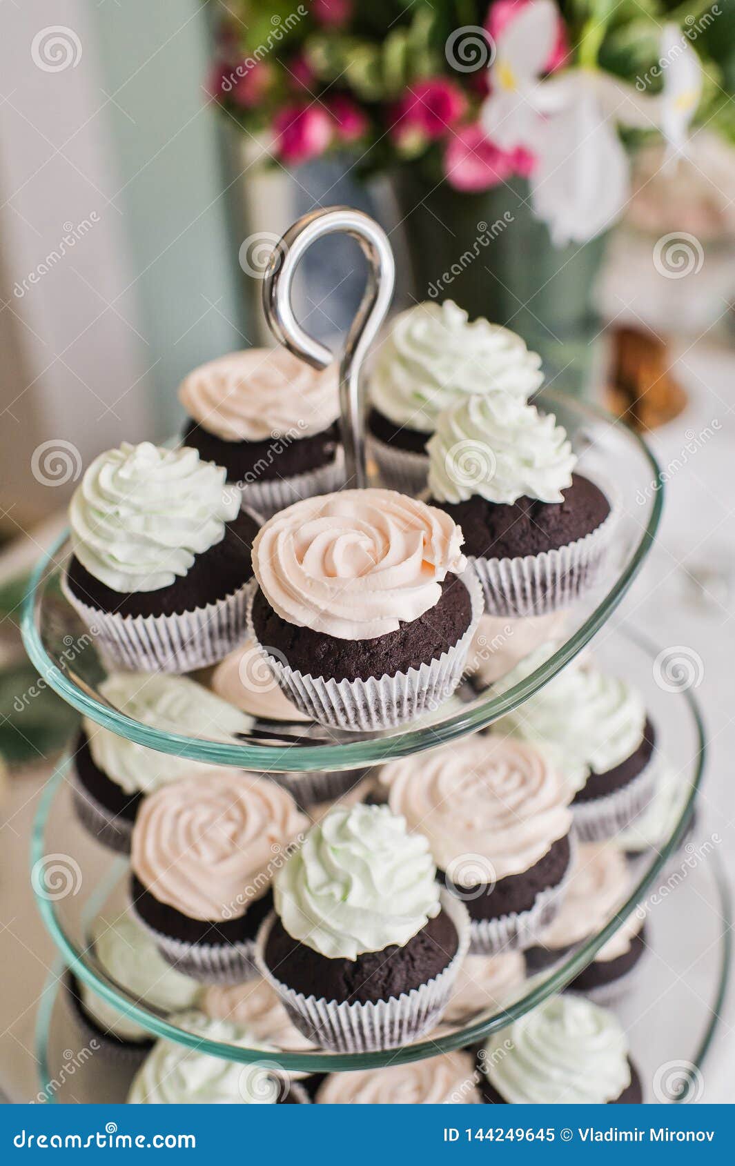 Pink and Green Cream Cupcake on the Buffet Table of the Restaurant ...