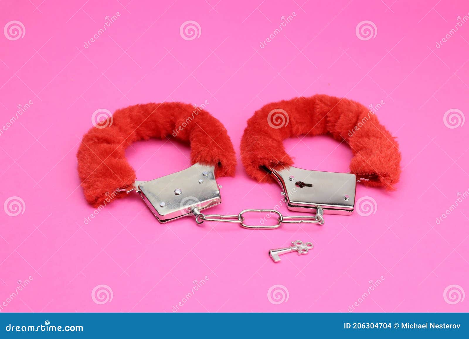 Pink Handcuffs with Key, on Pink Background Stock Photo - Image of ...