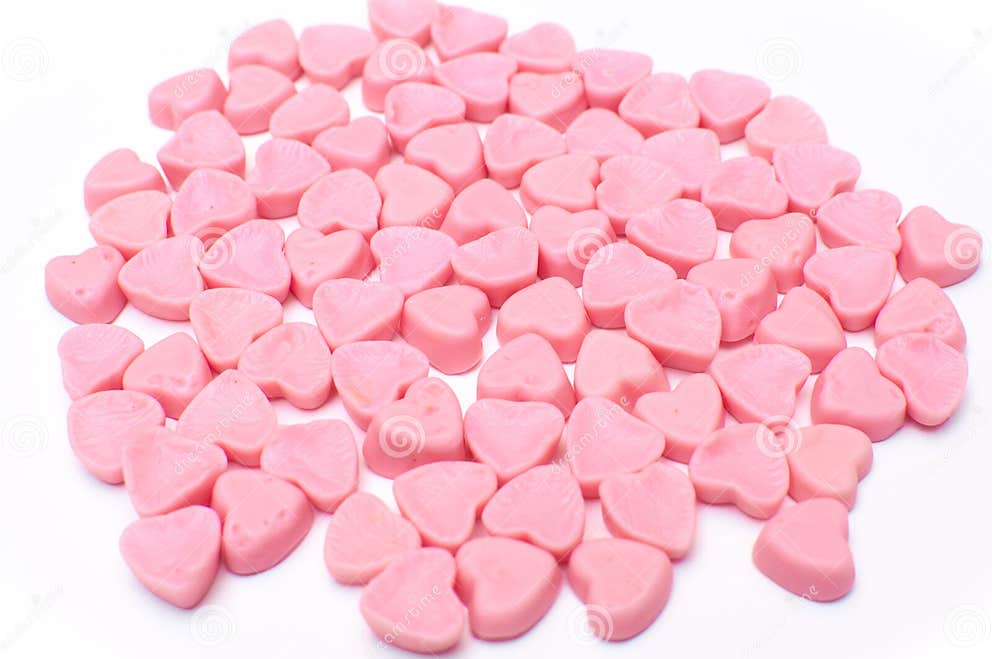 Pink hearts candy isolated stock photo. Image of heart - 85586910