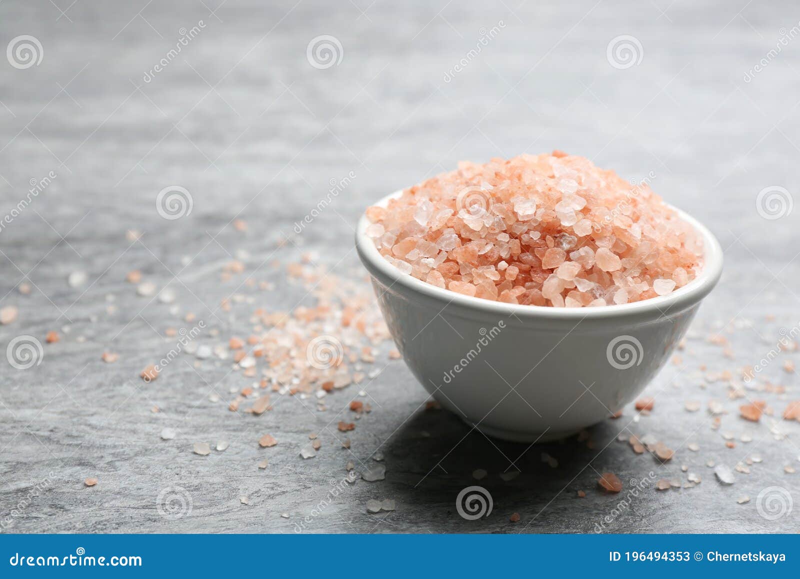 Pink Himalayan Salt on Grey Table, Closeup. Space for Text Stock Image ...