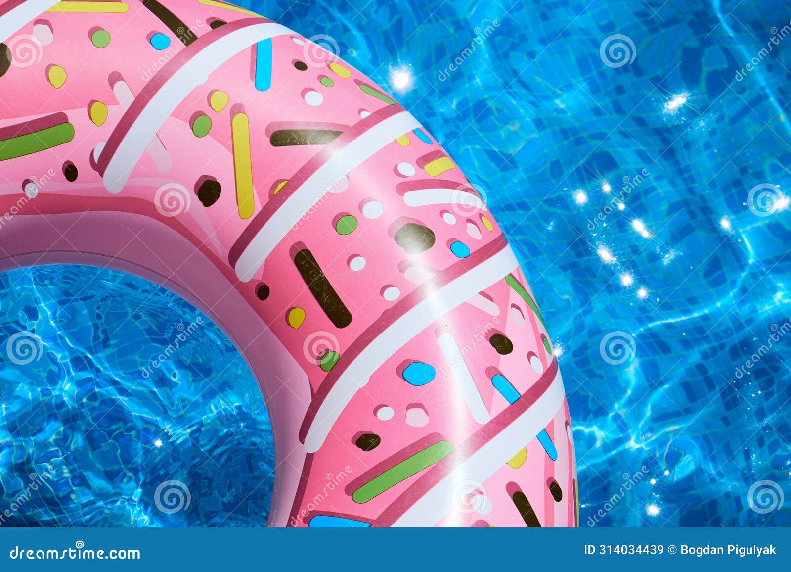 Pink Inflatable Ring in a Blue Outdoor Pool. Stock Image - Image of ...