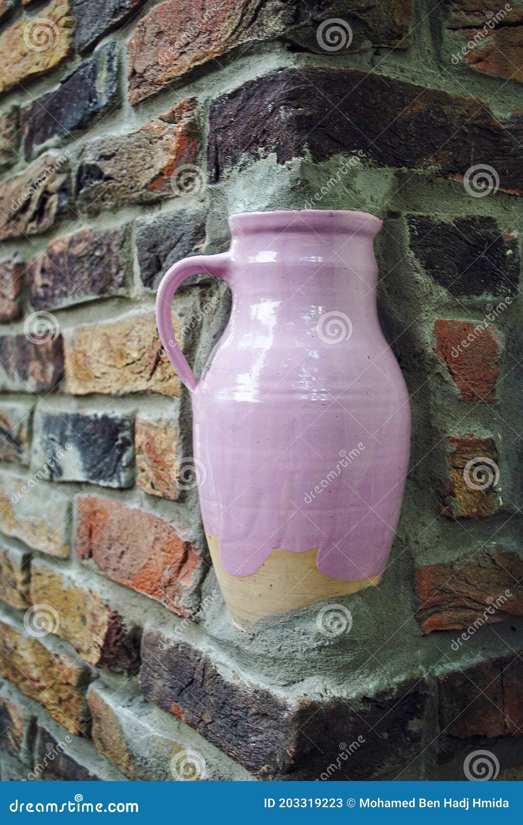 A pink jug. stock image. Image of vase, brick, closeup - 203319223